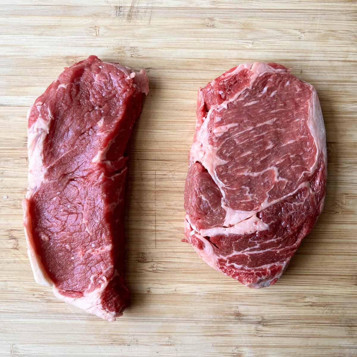 New York Strip vs. Ribeye: The Steak Comparison Series | Mad Backyard